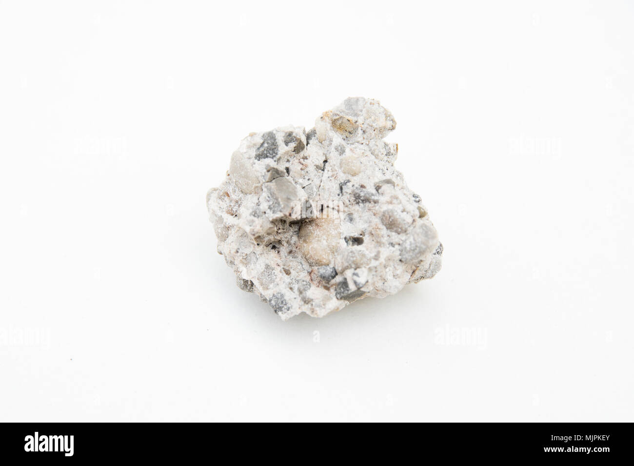 extreme close up with a lot of details of conglomerate rock isolated ...