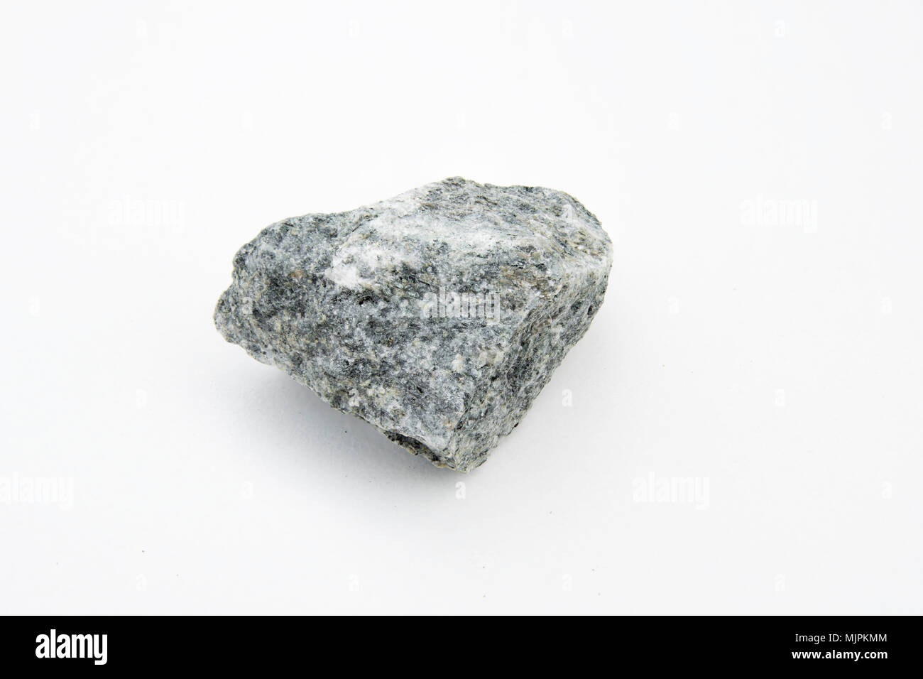 extreme close up with a lot of details of eclogite rock isolated over ...