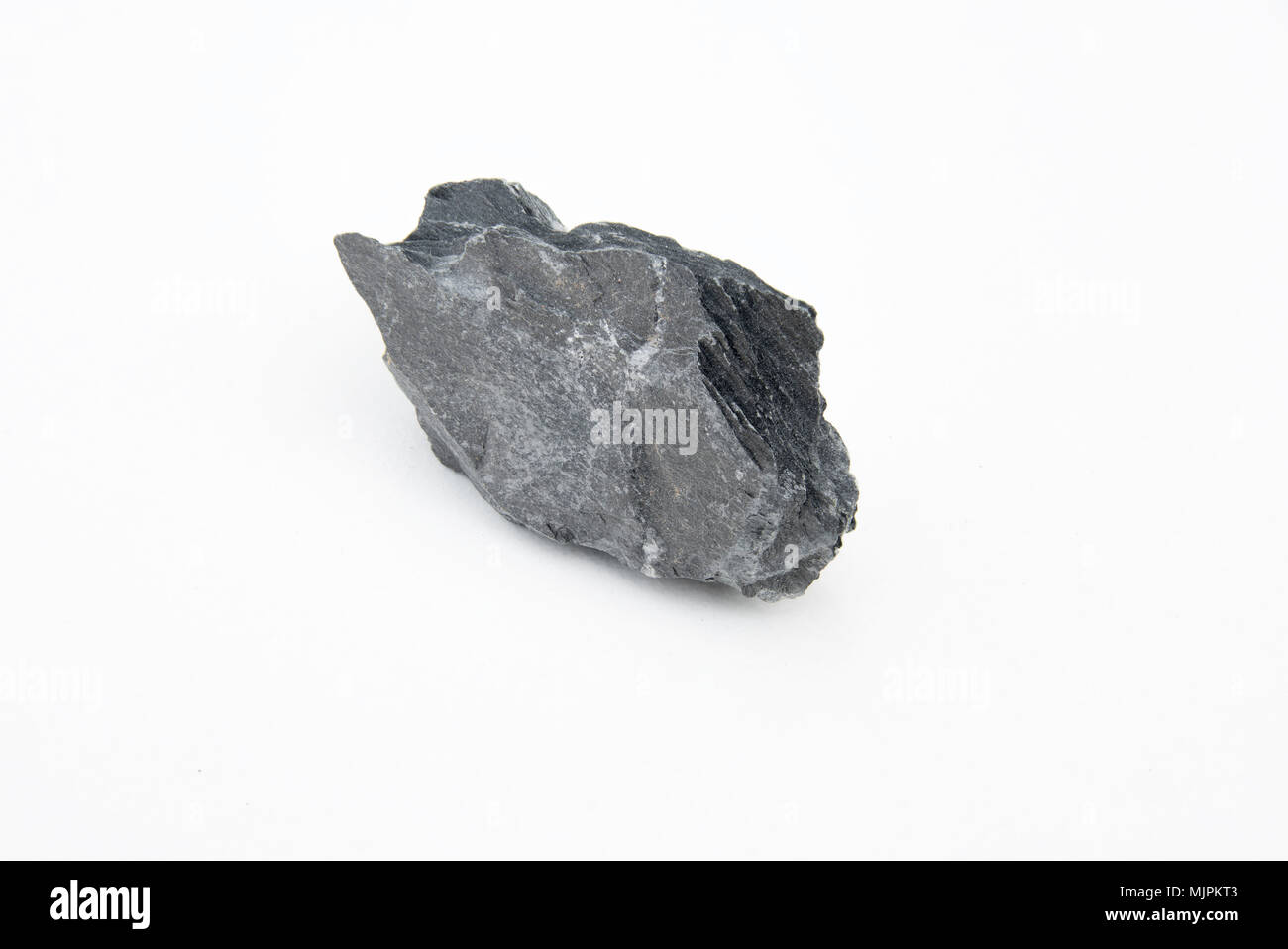 extreme close up with a lot of details of slate rock isolated over ...