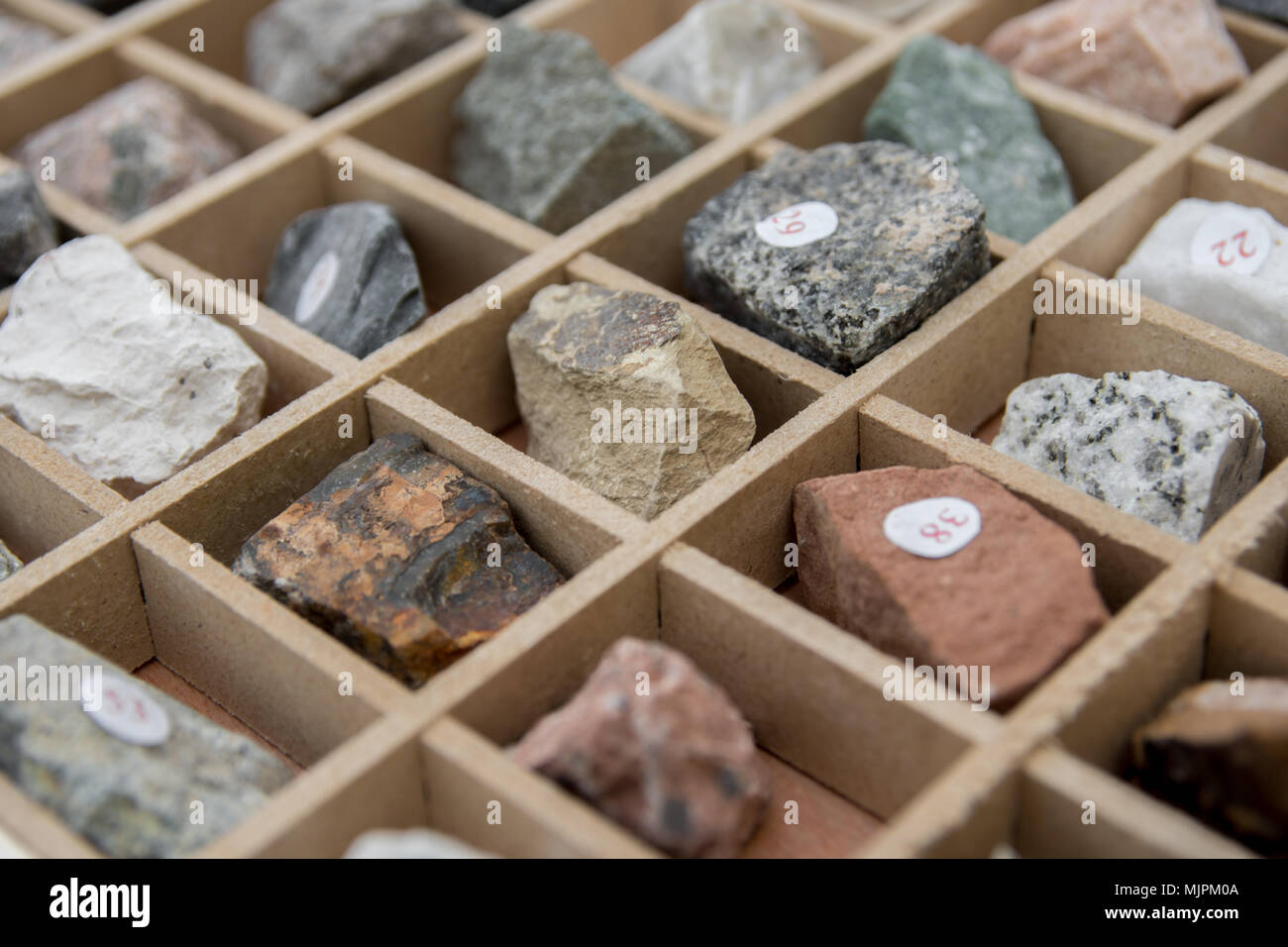 close up of set of minerals and stones inside of a wooden box Stock ...