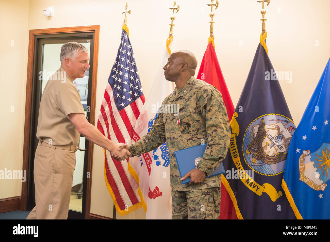 MECHANICSBURG, Pa. (Dec. 14, 2017) – A Marine Corps officer and Navy ...