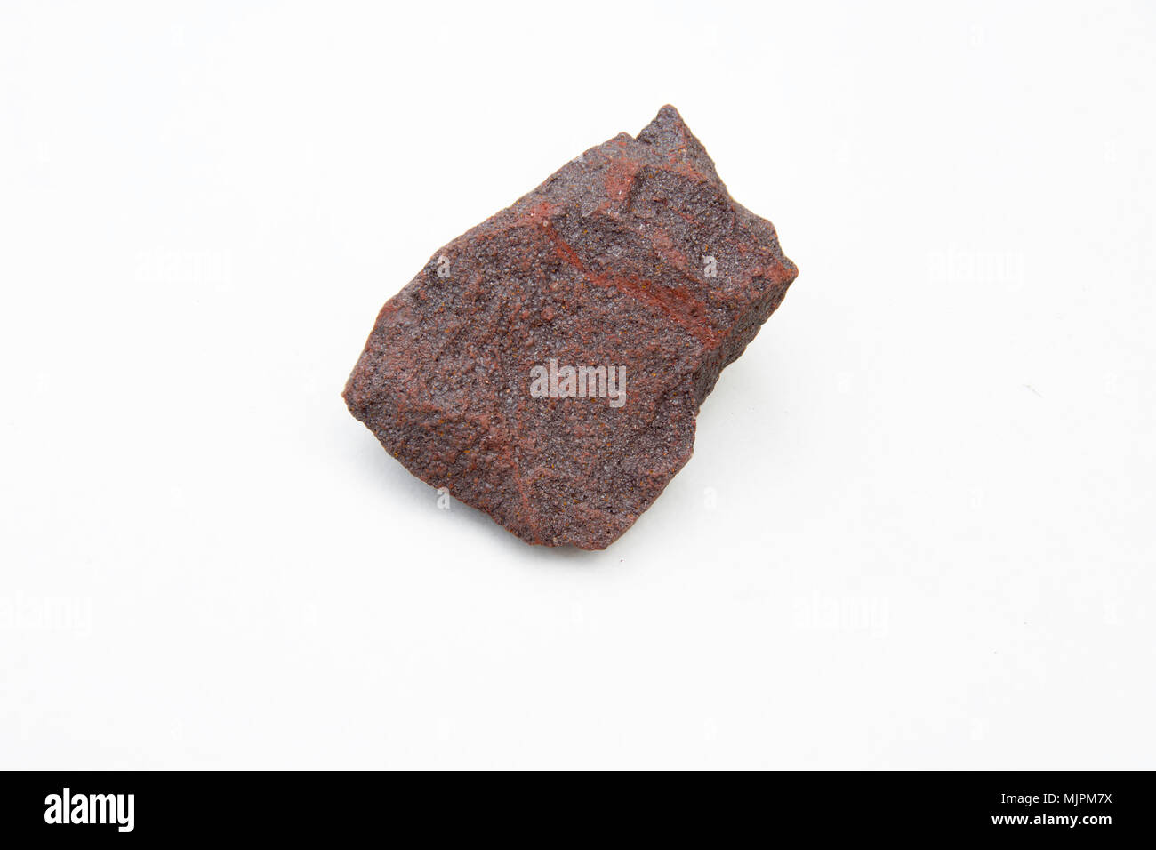 extreme close up with a lot of details of hematite mineral isolated ...