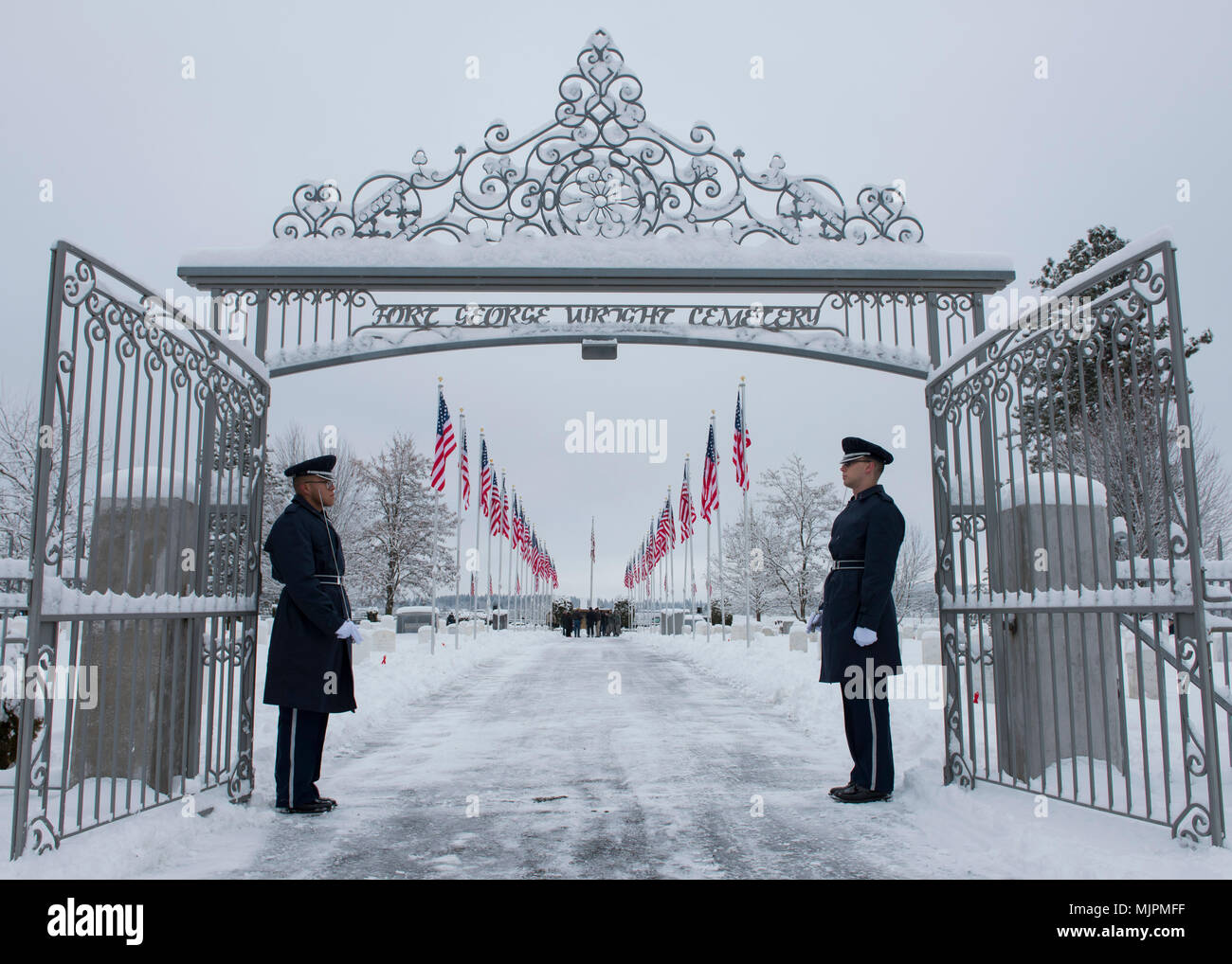 Two members of the Fairchild Air Force Base Honor Guard stand at the ...