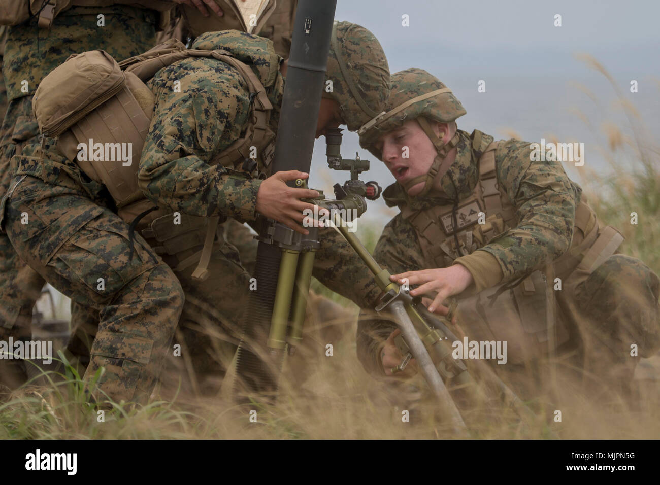 Lance Cpl. Felix Ruiz, left, and Lance Cpl. Devon Flynn, confirm the ...