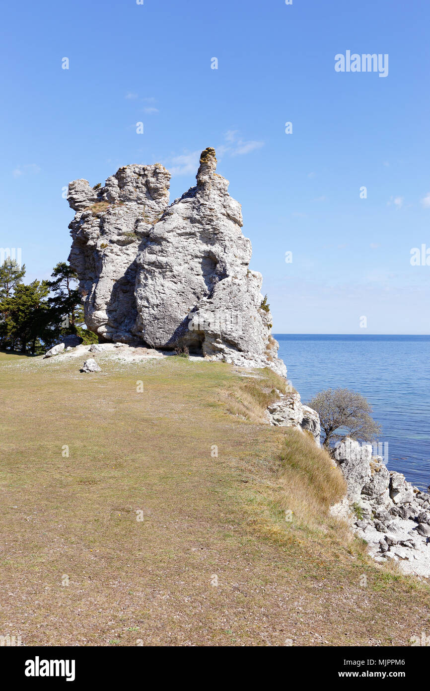 The sea stack named Jungfrun (Virgin) near the village Lickerhamn on ...