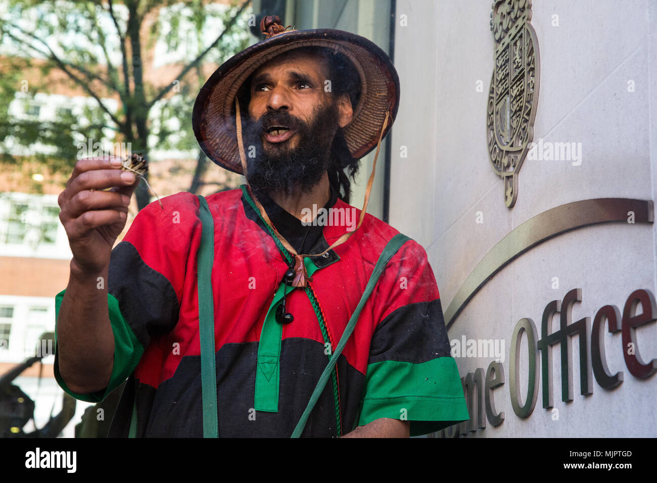 London, UK. 5th May, 2018. Asheber stands with a joint outside the Home ...