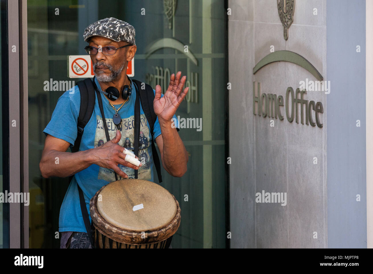 London, UK. 5th May, 2018. A musician drums during a protest outside ...