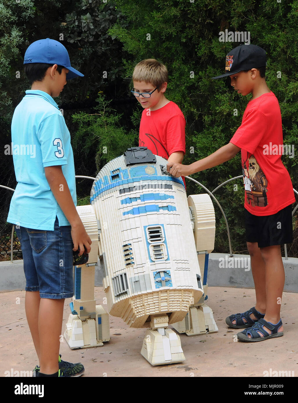 Winter Haven, Florida, USA, May 5, 2018. Boys interact with a LEGO ...