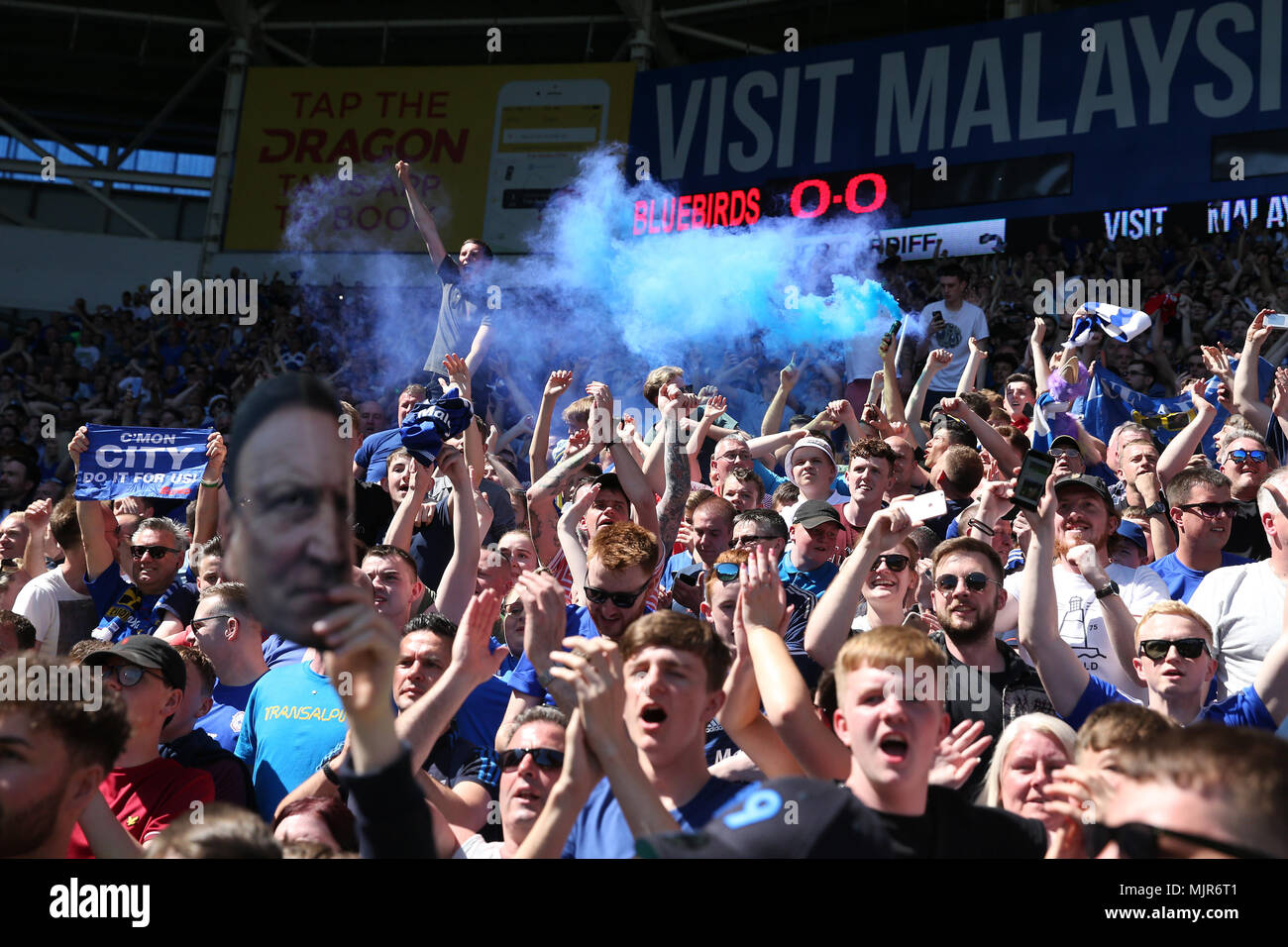 Cardiff, UK, 6 May 2018. Cardiff city fans celebrate after the match as ...