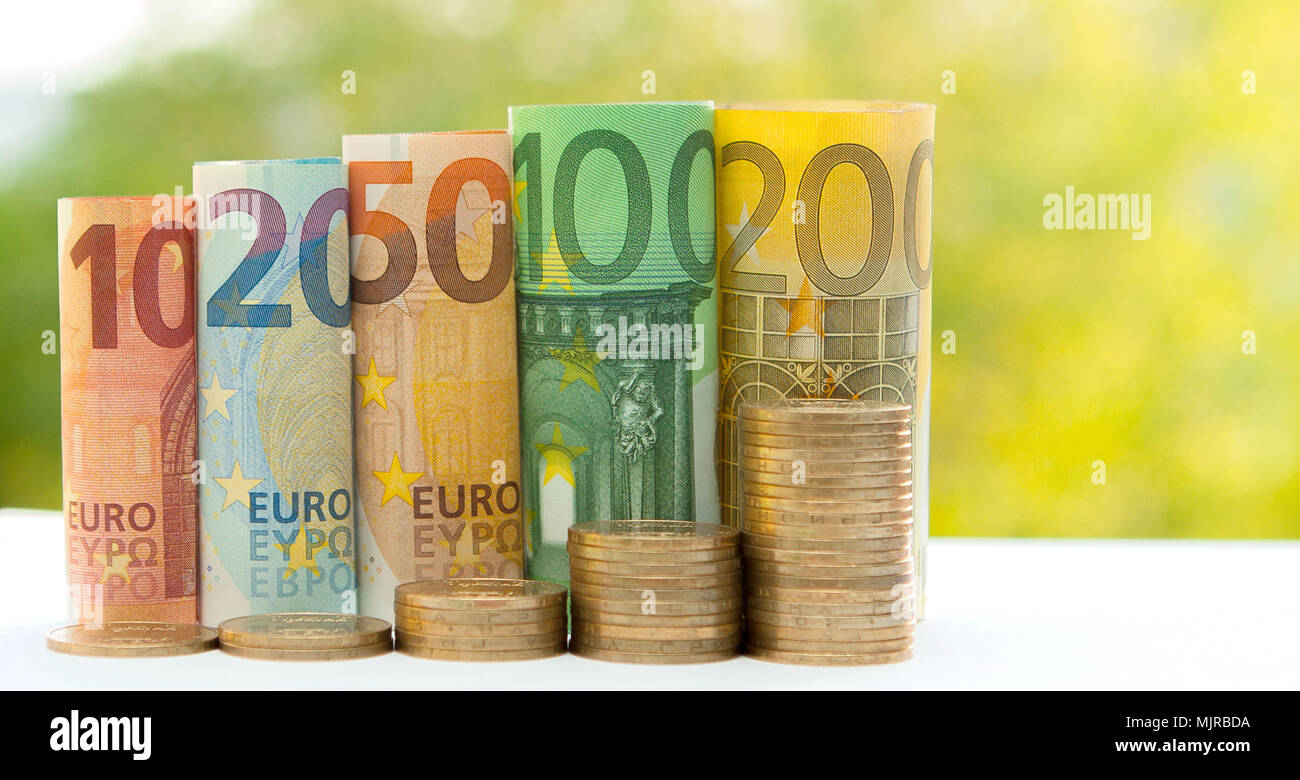 Ten, twenty, fifty, one hundred, two hundred and coins euro rolled ...