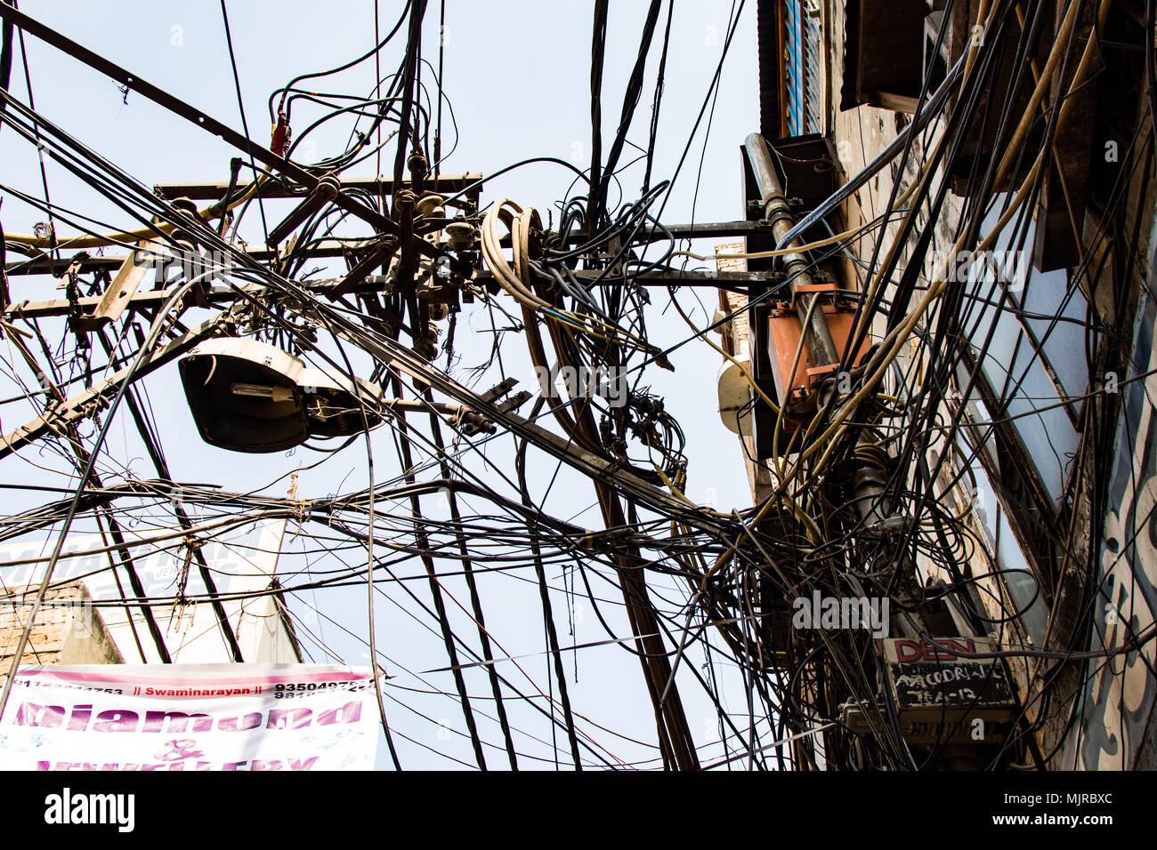 New Delhi, India, Feb 19, 2018 - Overhead cables create a rats maze ...