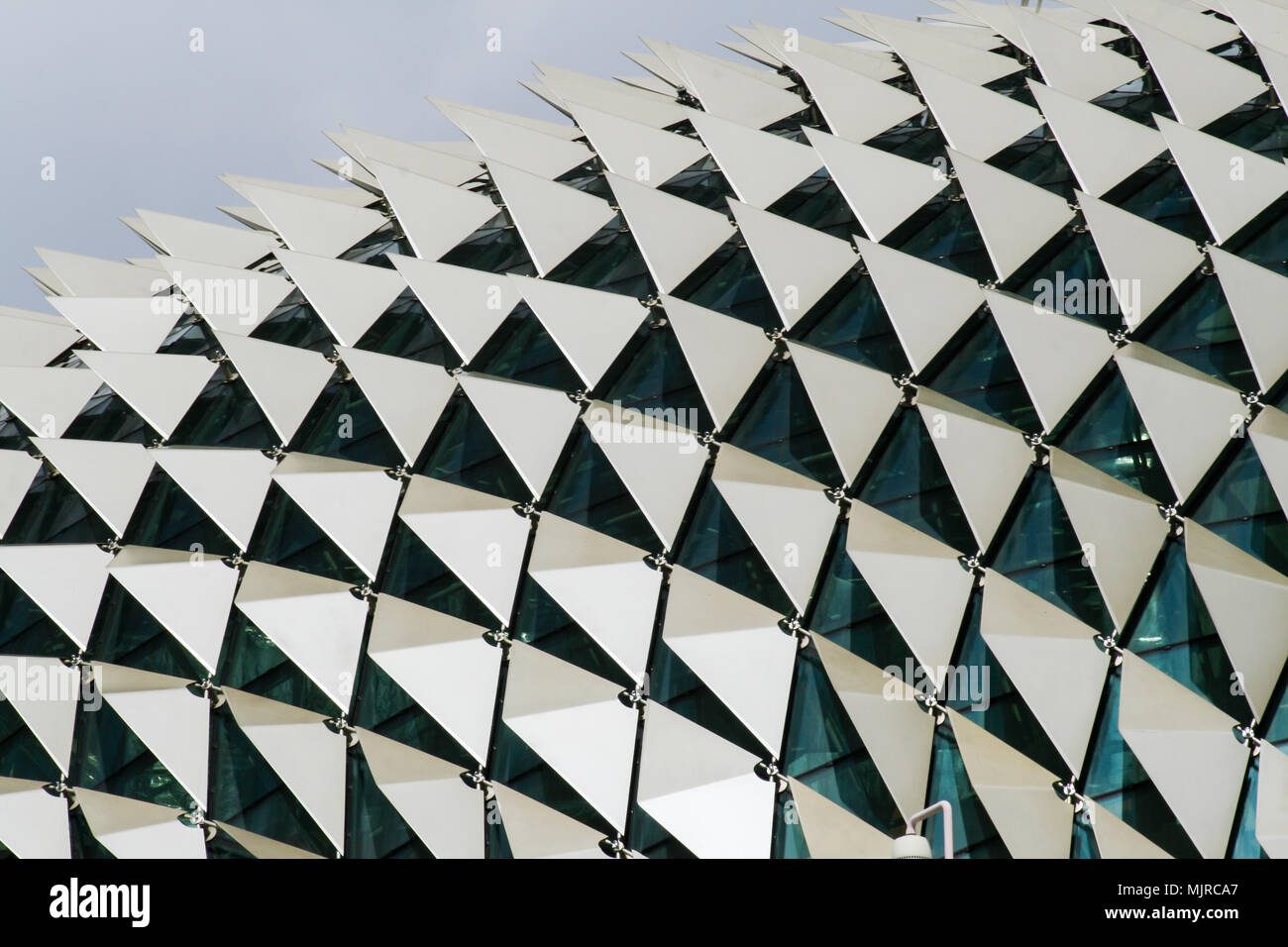 Close up image showing detail of the roof of a building showing windows ...