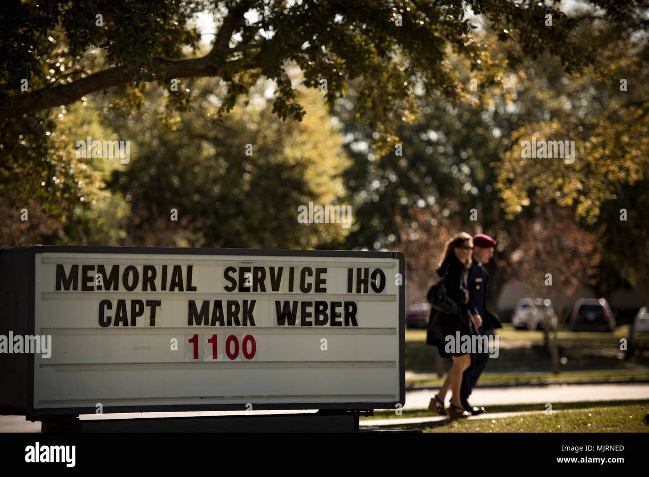 Guests arrive to a memorial service in honor of Capt. Mark Weber, March ...