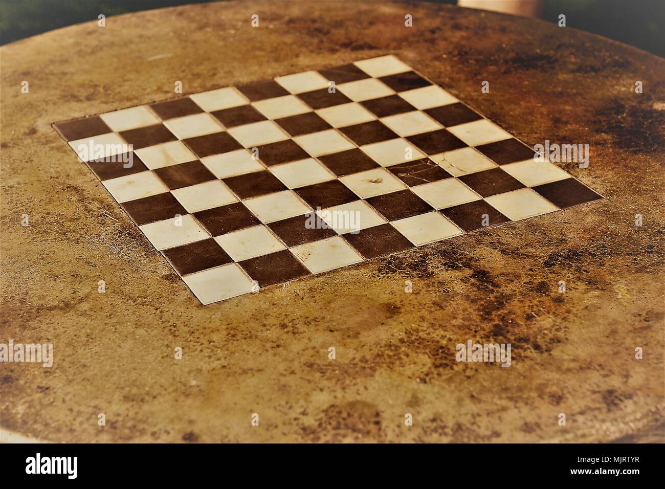 Checkerboard or chessboard set in stone Stock Photo - Alamy