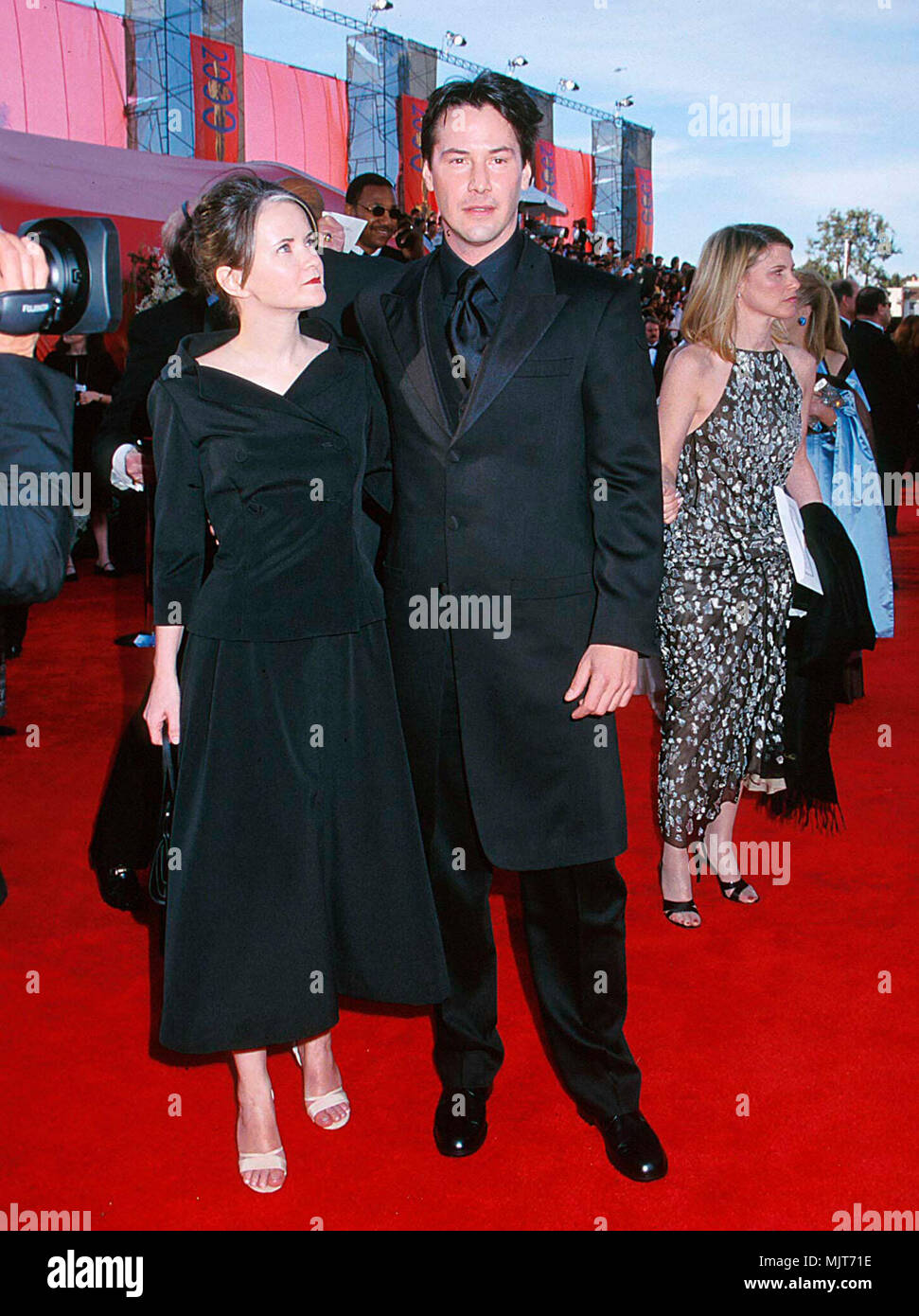 26 Mar 2000, Los Angeles, California, USA --- Keanu Reeves with a ...
