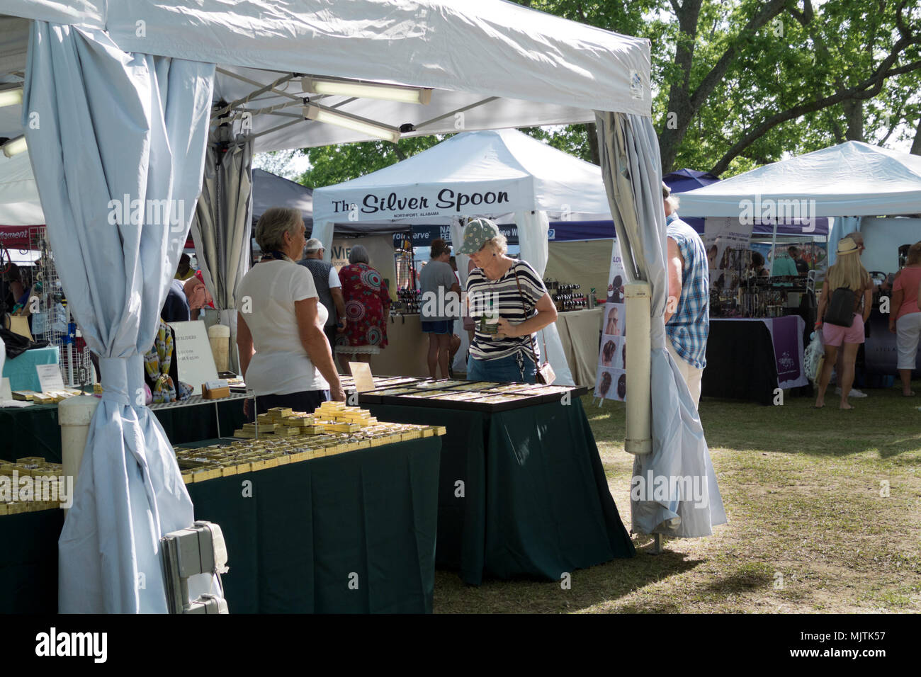 People shopping at arts and crafts fair of the 14th annual Hot Air ...