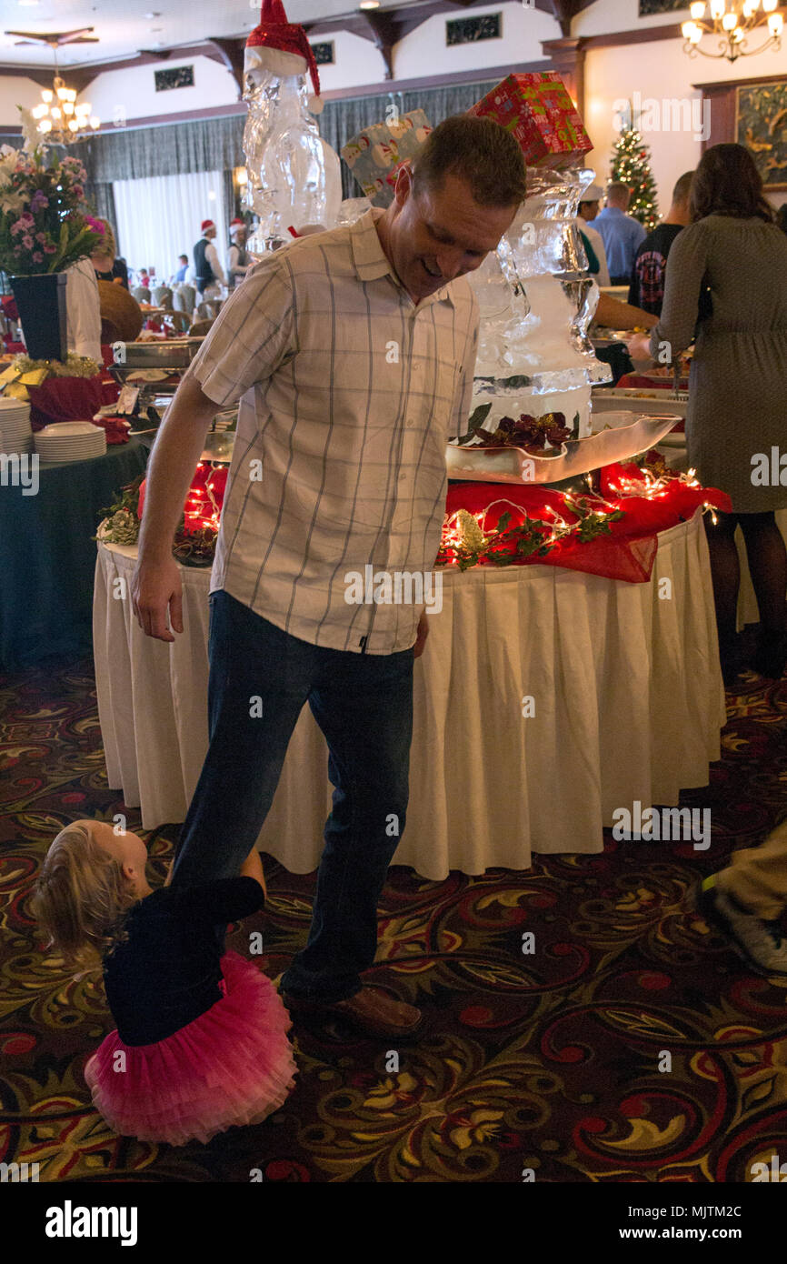 CAMP FOSTER, OKINAWA, Japan- A father and daughter play together during ...
