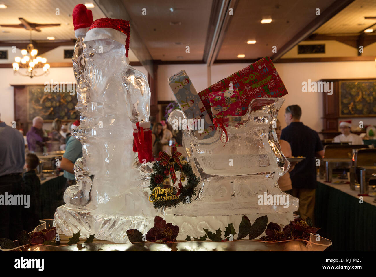 CAMP FOSTER, OKINAWA, Japan- An ice sculpture of Santa is displayed at ...