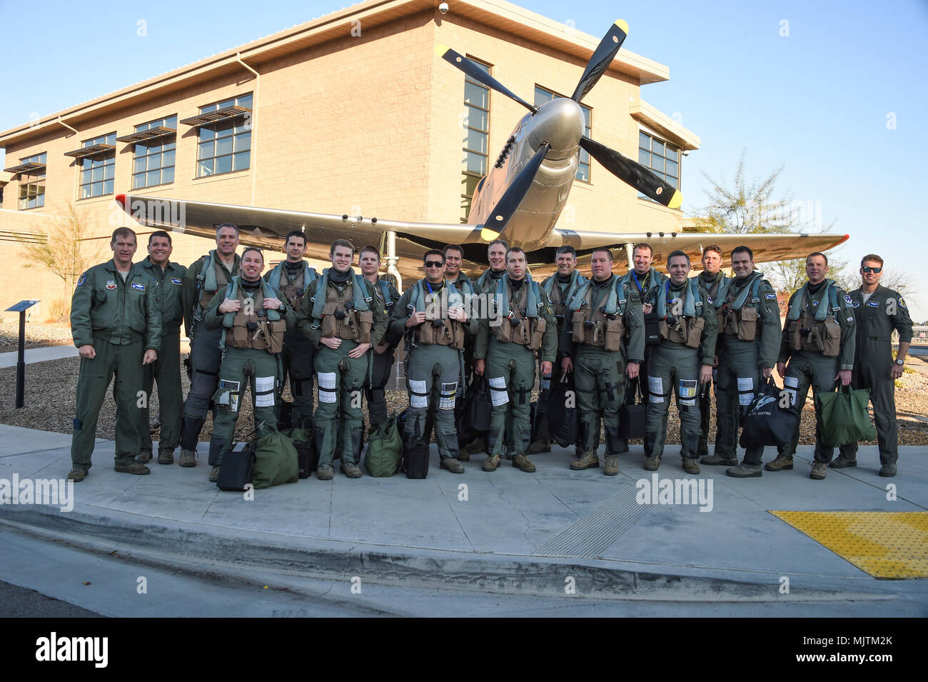 194th Fighter Squadron pilots from the 144th Fighter Wing pause for a ...