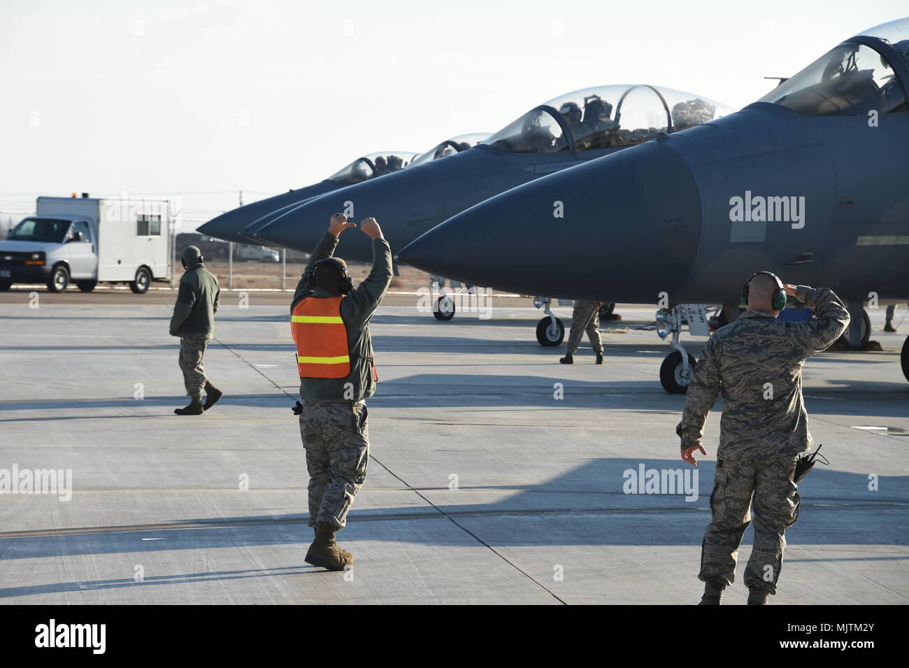 144th Fighter Wing end of runway crews perform final checks on the F-15 ...