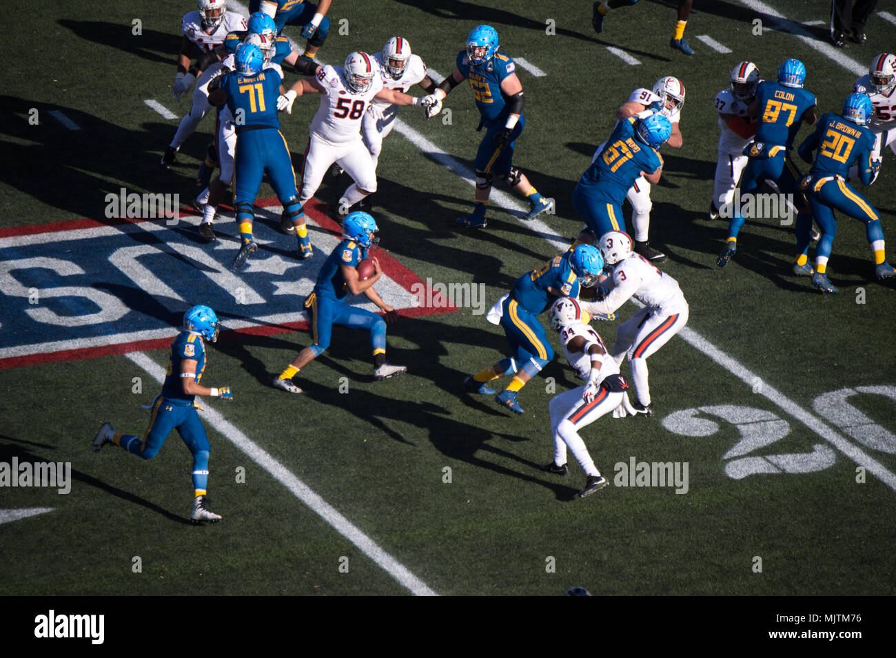 Navy Quarterback Malcolm Perry, 10, runs the ball during the 2017 ...