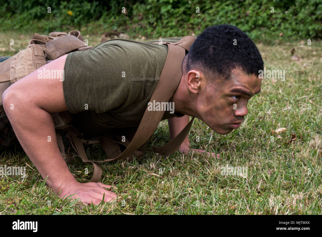 A Marine with Alpha Company, Battalion Landing Team, 1st Battalion, 1st ...