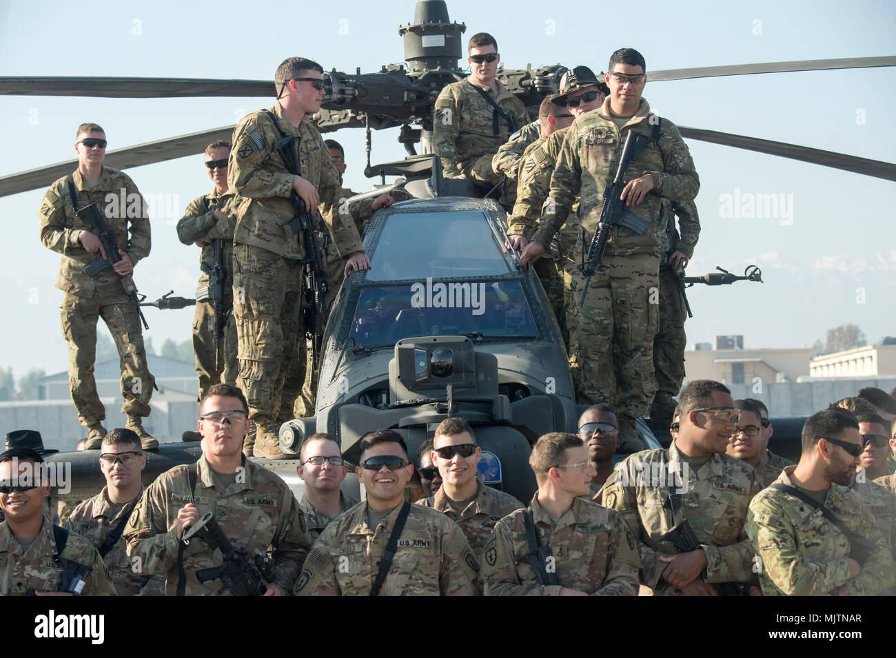 Soldiers wait for the arrival of the USO Holiday Tour at Operating Base ...