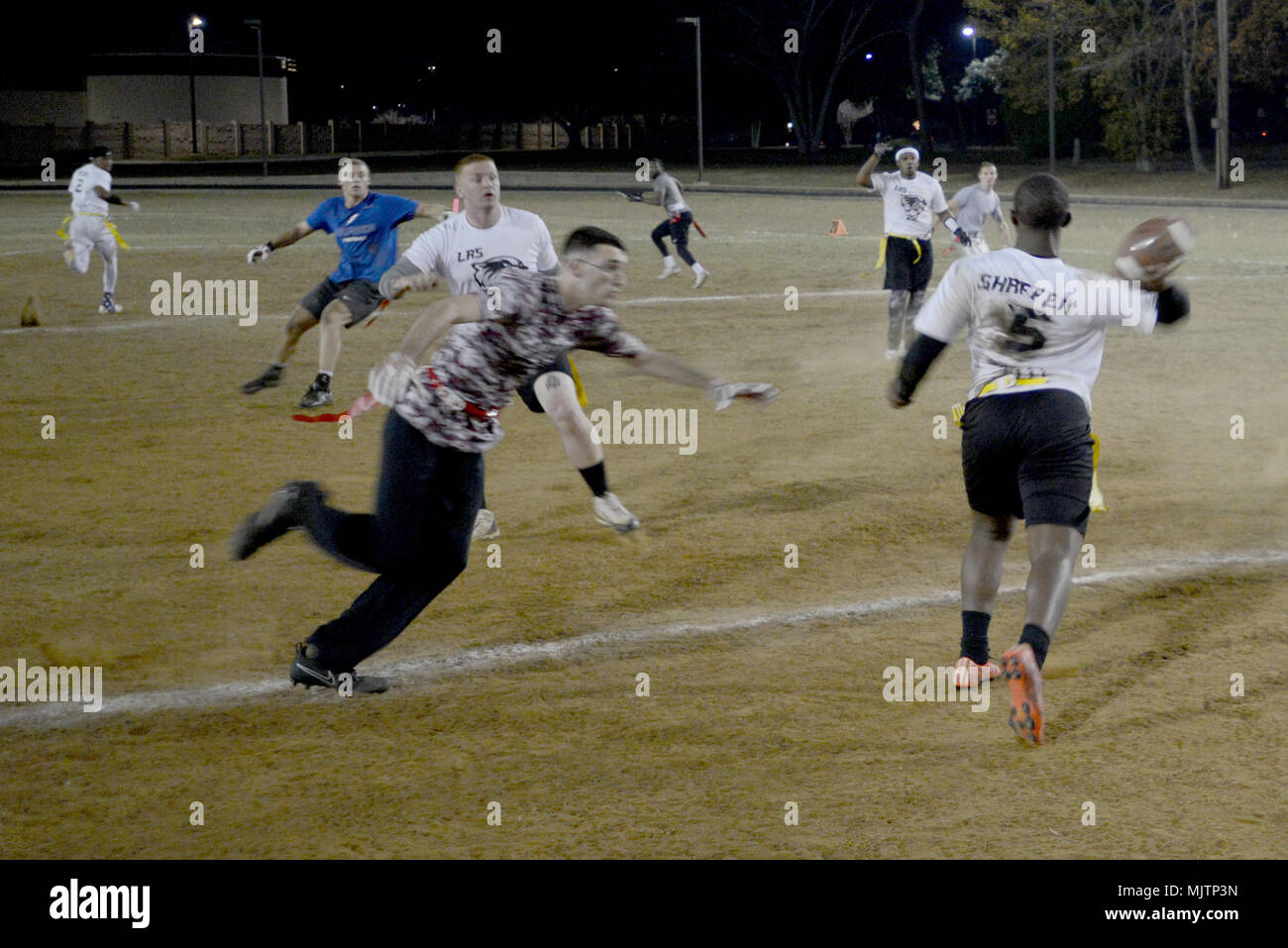 The 20th Logistics Readiness Squadron (LRS) team quarterback throws a ...