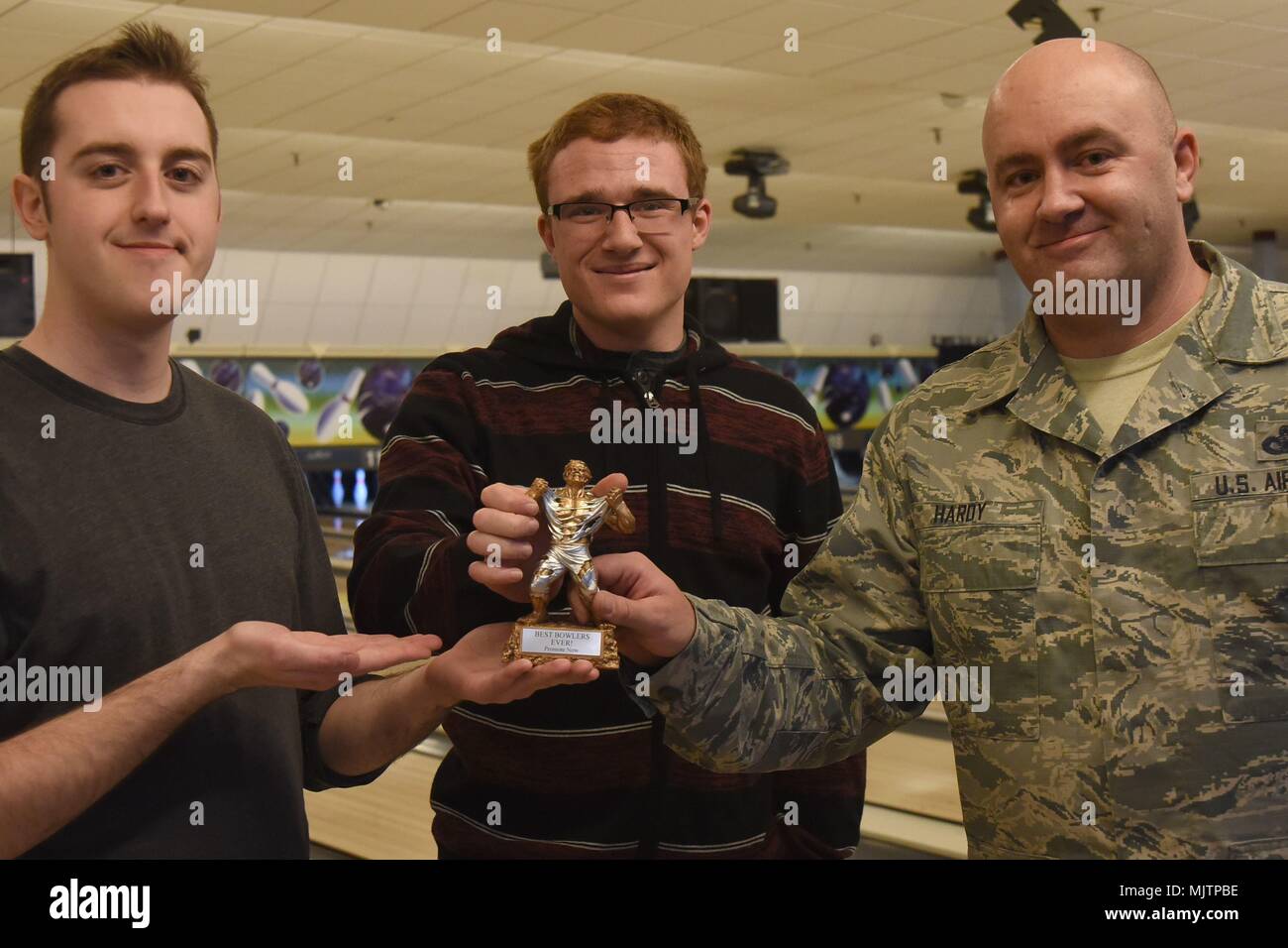 Airman 1st Class Trevor Colt, left, Airman 1st Class Nathan Shumer ...