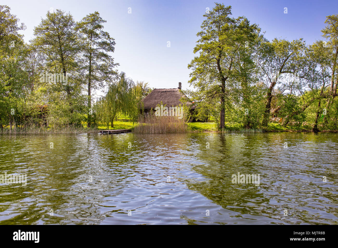 Traditional old polish countryside wooden thatched houses and farmyards ...