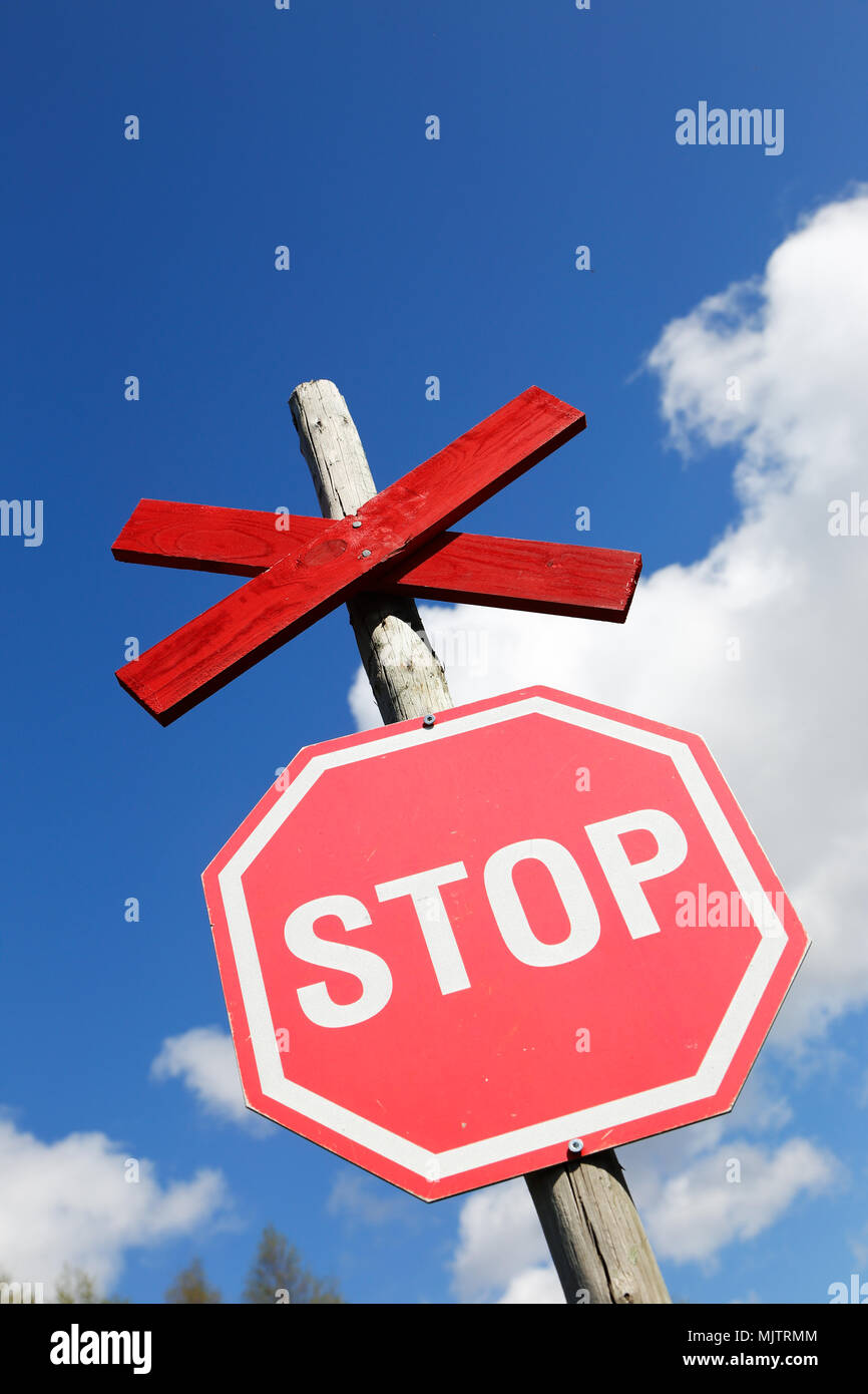 Swedish stop sign before snowmobile trail crossing the road Stock Photo ...