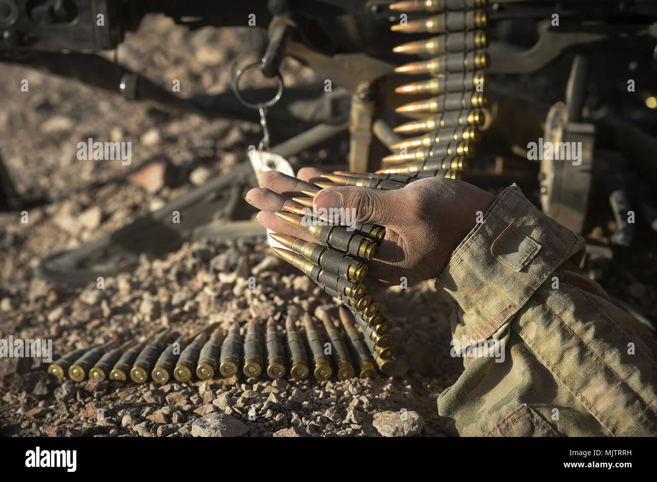 A U.S. Army assistant gunner from Animal Company, 3rd Battalion, 141 ...