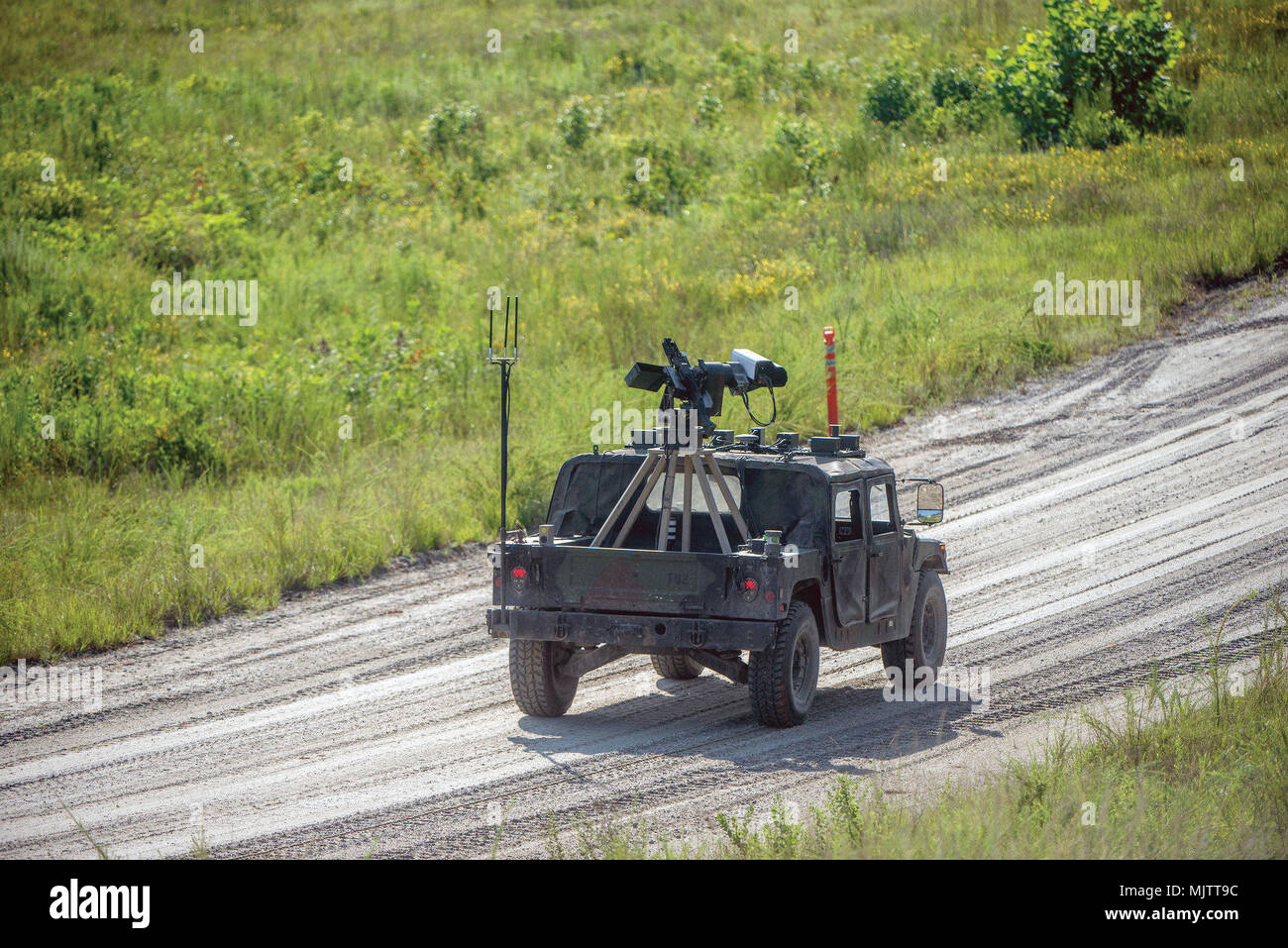 The Robotic Wingman vehicle maneuvers semiautonomously through a Scout ...