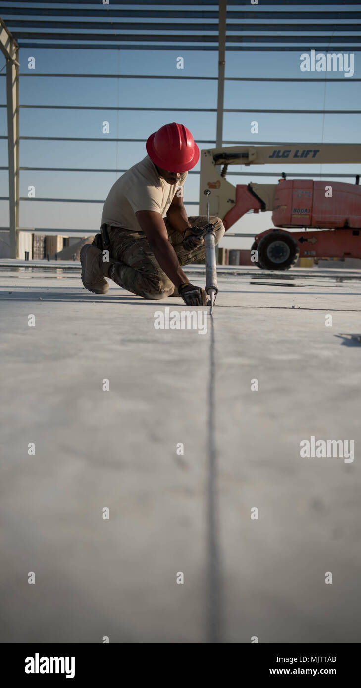 U.S. Air Force Staff Sgt. Forrest Dickson, a pavement and equipment ...