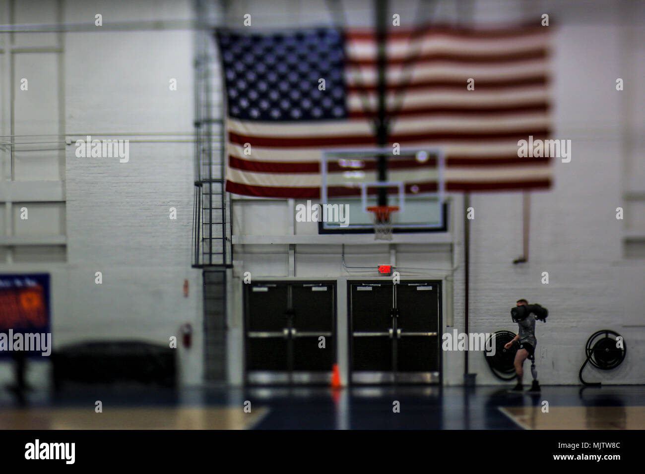 Cpl. Rory Hamill, a combat-wounded Marine, works out in the base gym on ...