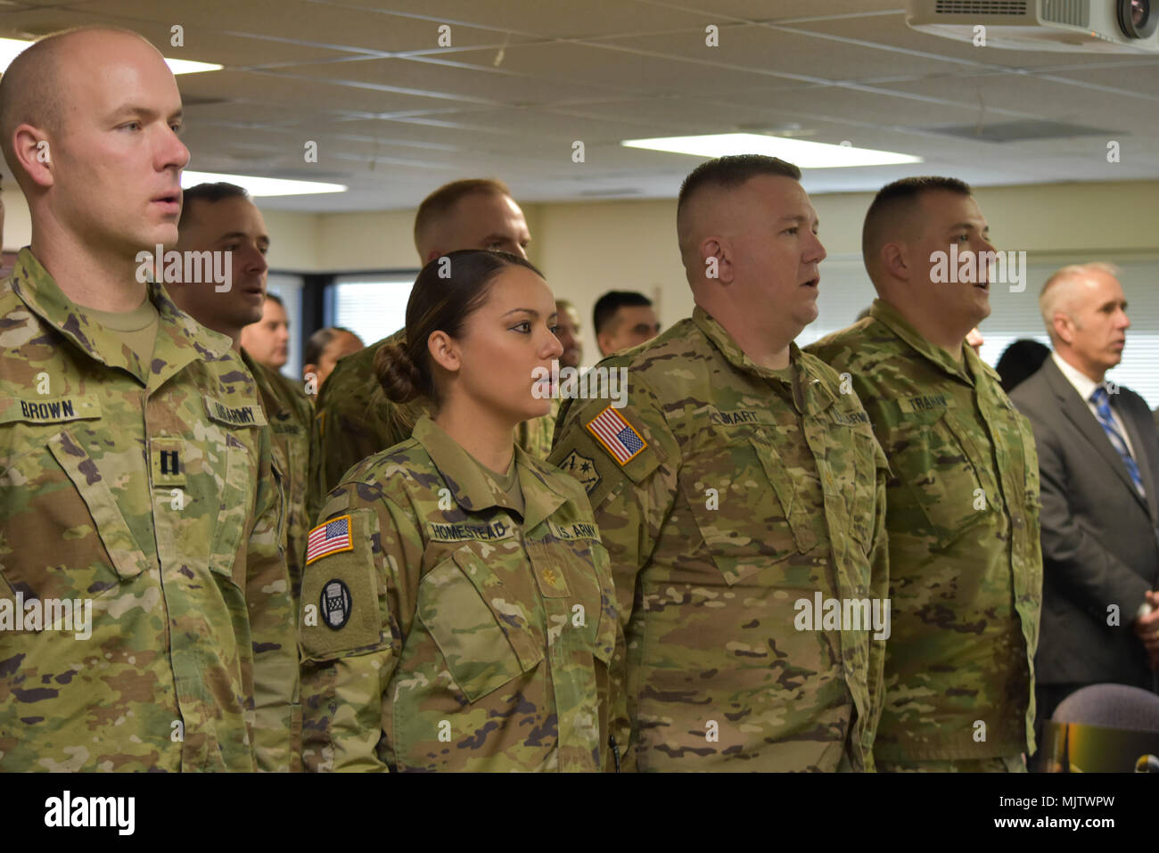 Army Maj. Terri Rae Lopez-Homestead stands among the nine 100th Missile ...