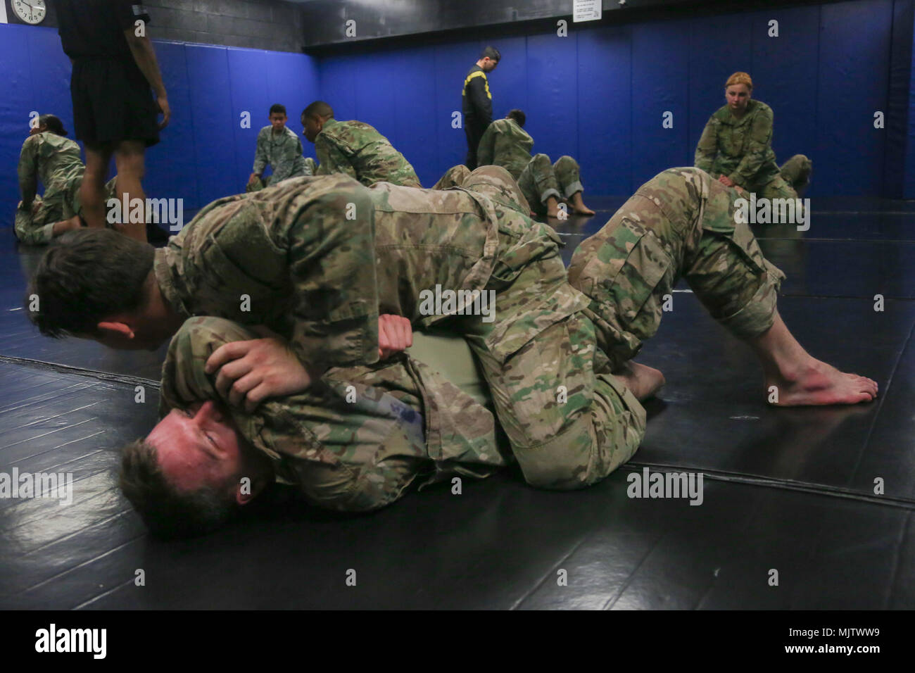 U.S. Army Spc. Christopher Brecht, (top) assigned to the 55th Signal ...