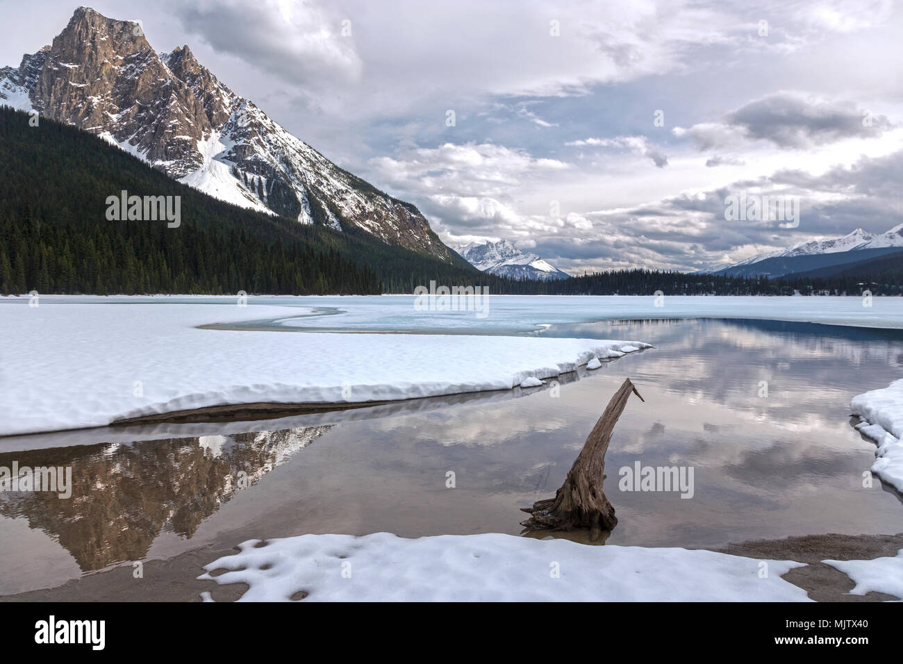 Emerald Lake Melting Ice Scenic Landscape View Cloud Covered Skyline ...