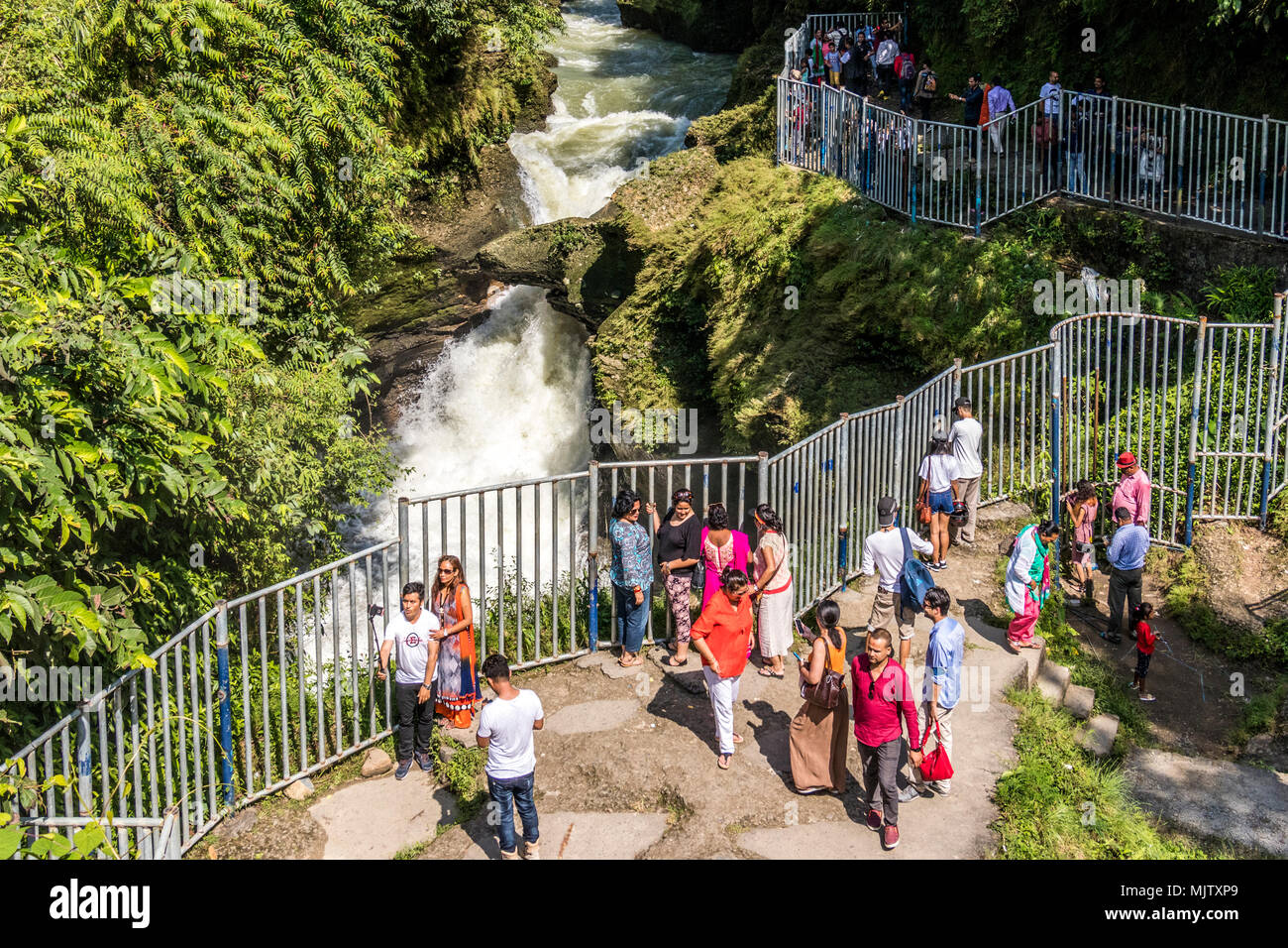 Visitors and tourist going to the Davi's falls in Pokhara in Nepal ...