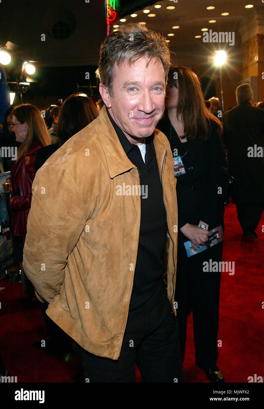 Tim Allen posing at the premiere of joesomebody at the Man Village ...