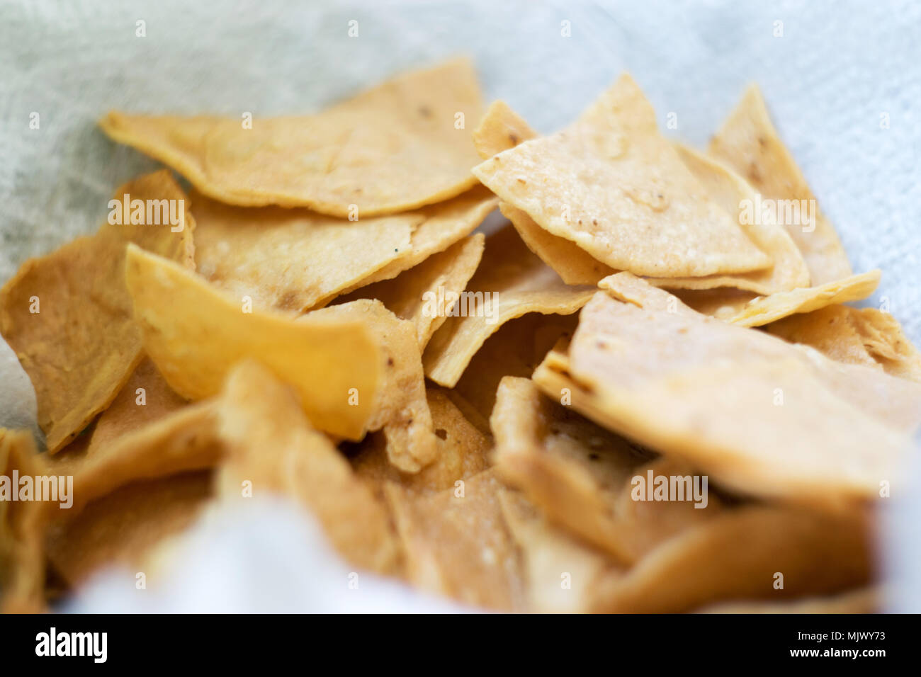Totopos, typical Mexican snack chips in basket Stock Photo - Alamy