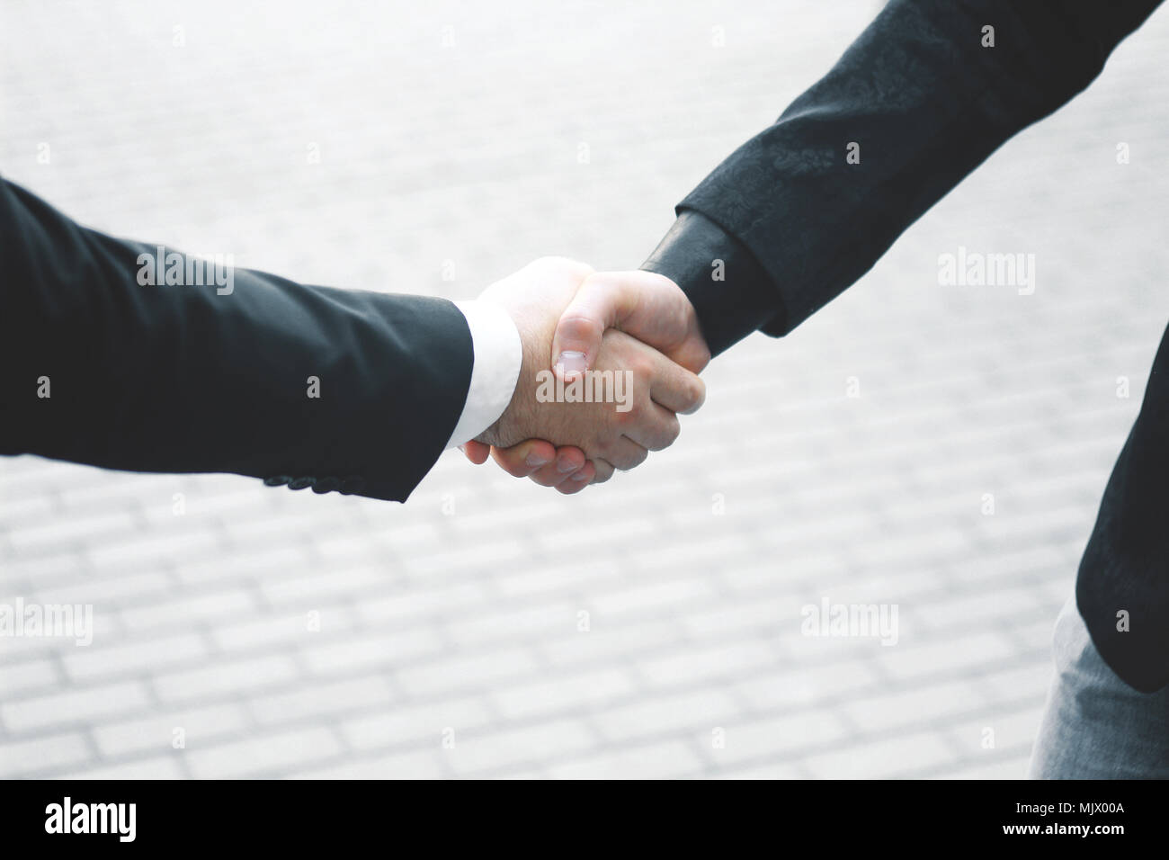 close up. handshake business partners on blurred background Stock Photo ...