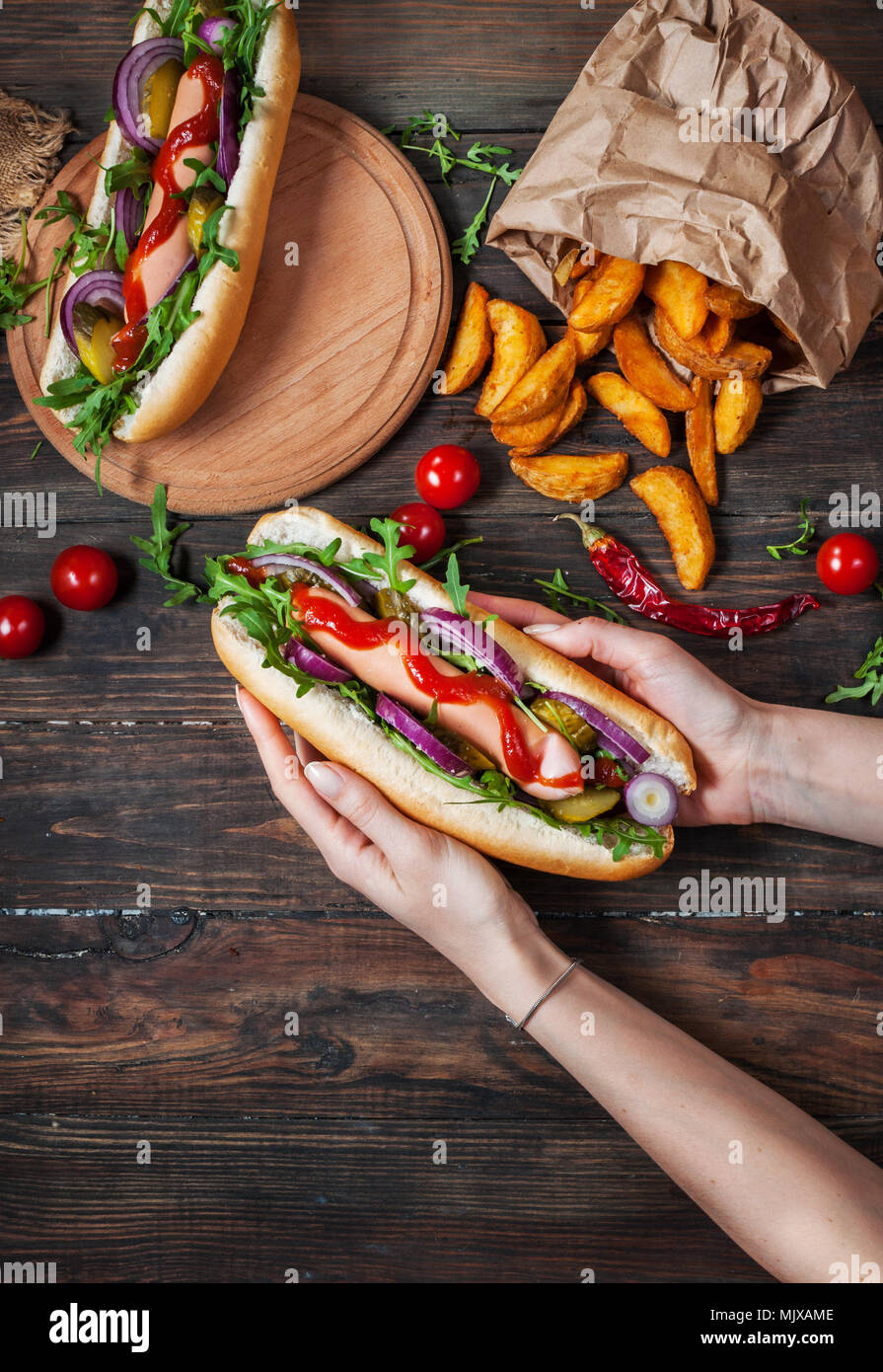 Hands with hotdog hi-res stock photography and images - Alamy
