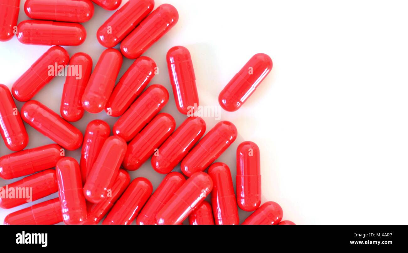 Red and white capsules hi-res stock photography and images - Alamy