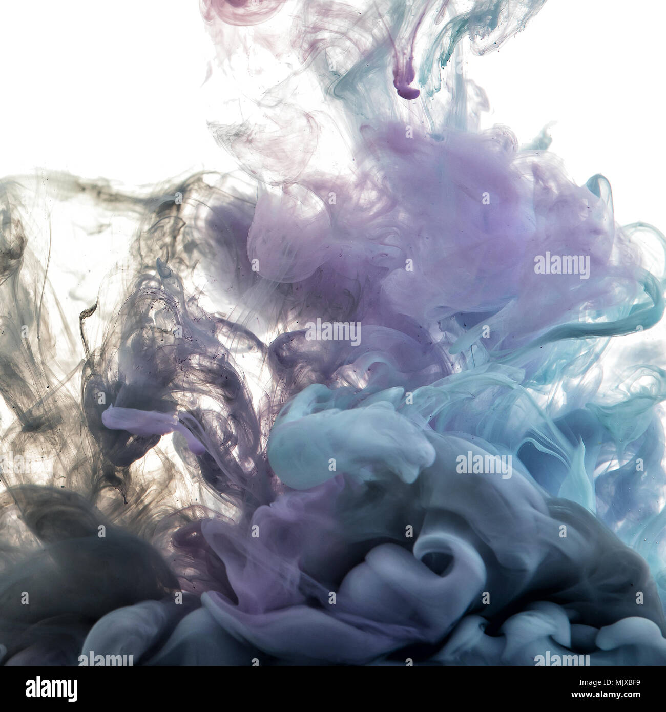 color splashes of ink Stock Photo - Alamy