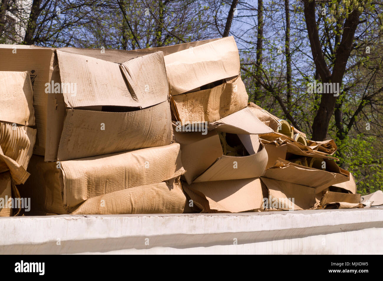 used beige cardboard boxes background Stock Photo - Alamy