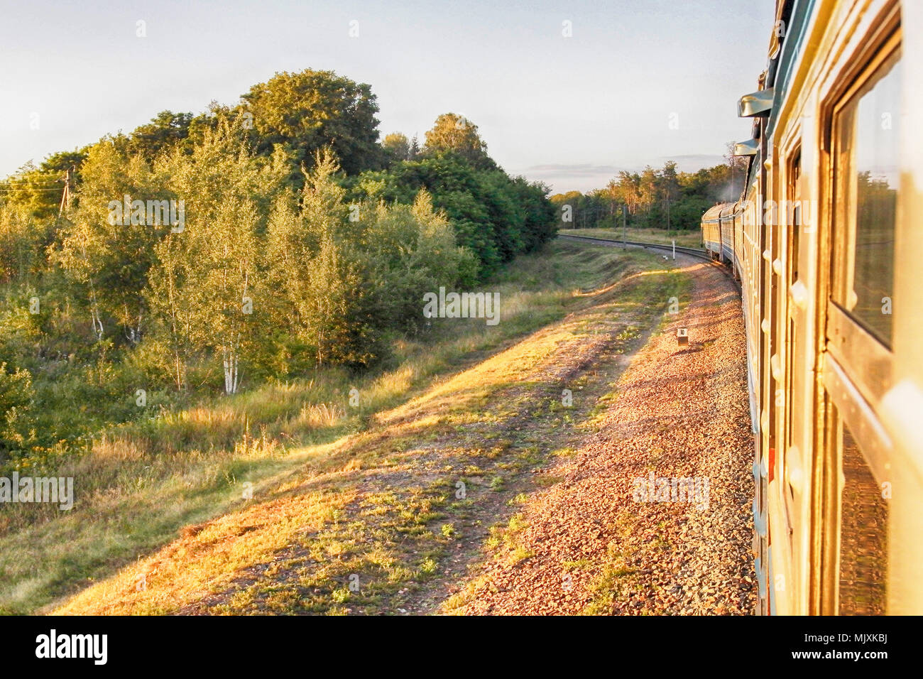 Usual mode of transport in Russia. Electric trains (commuter rail) with ...