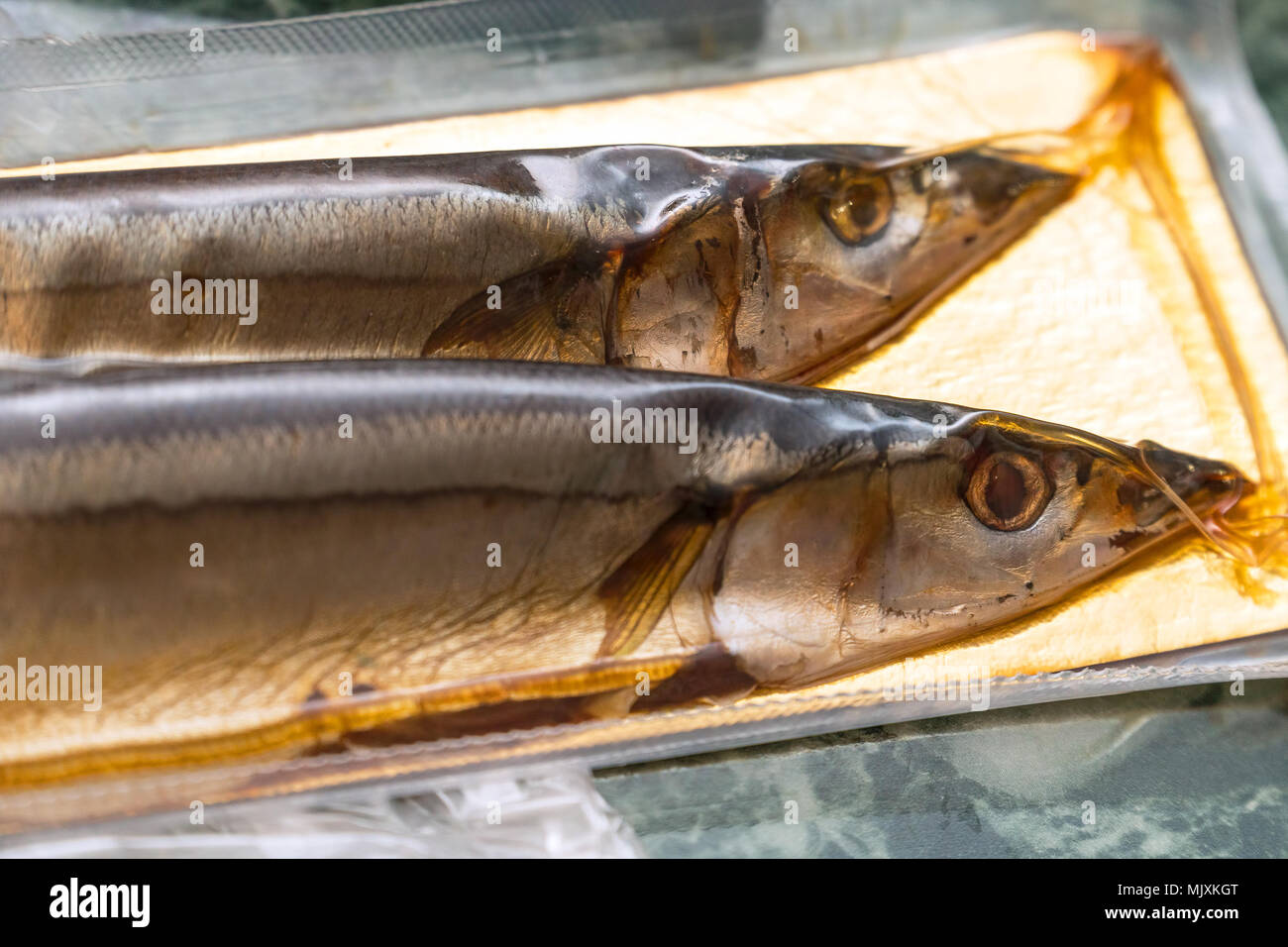 Dried fish packaging hi-res stock photography and images - Alamy