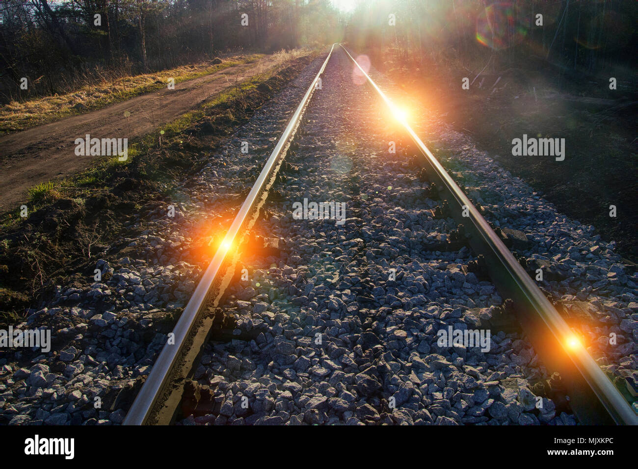 Railway and reflections of the sun on the rails. photo contour Stock ...