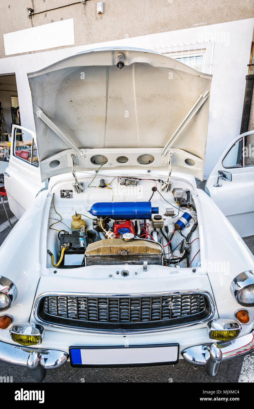 Engine under the hood of an old car. Retro automobile. Old vehicle ...